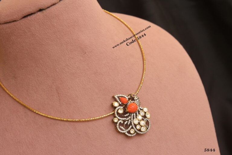 Gold hasli with peacock mozonite stone pendant and coral carving stone ...