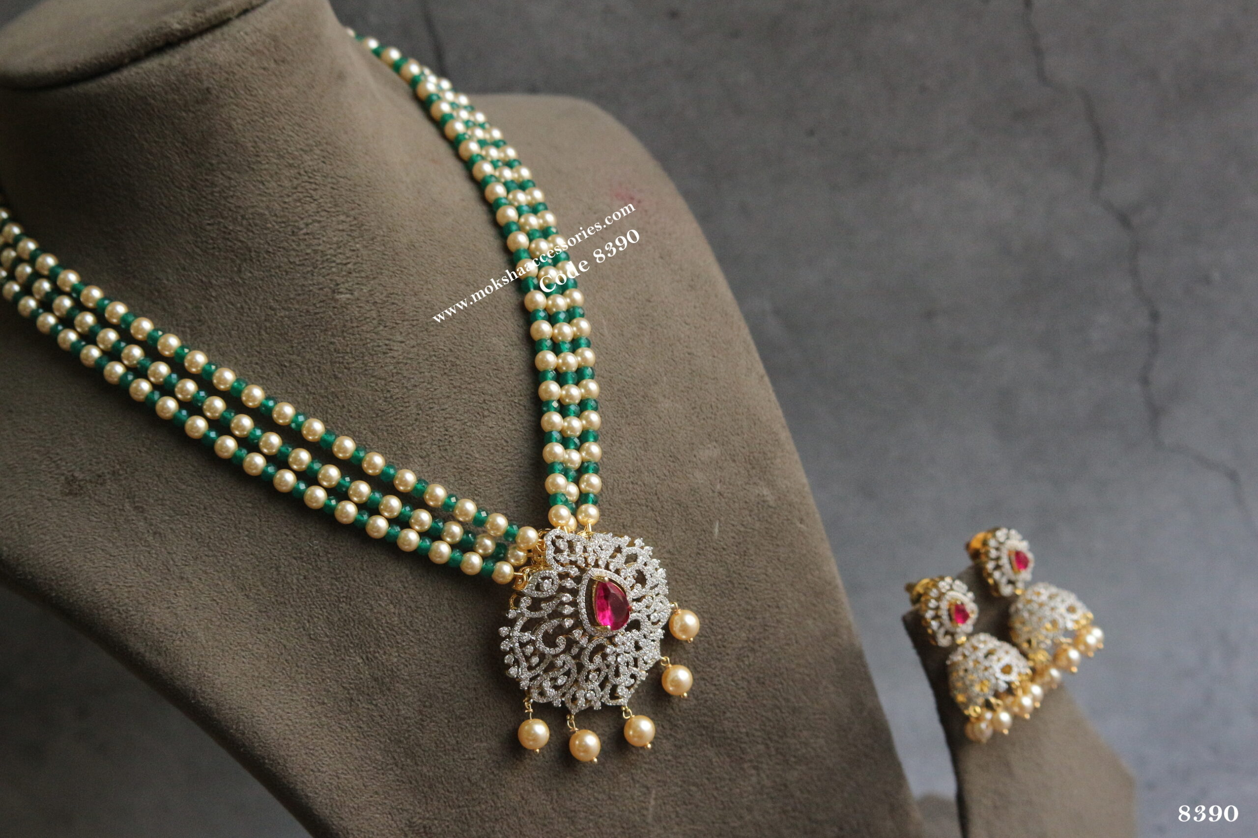 Diamond alike ruby stone pendant set with sarvoski pearls and ruby ...